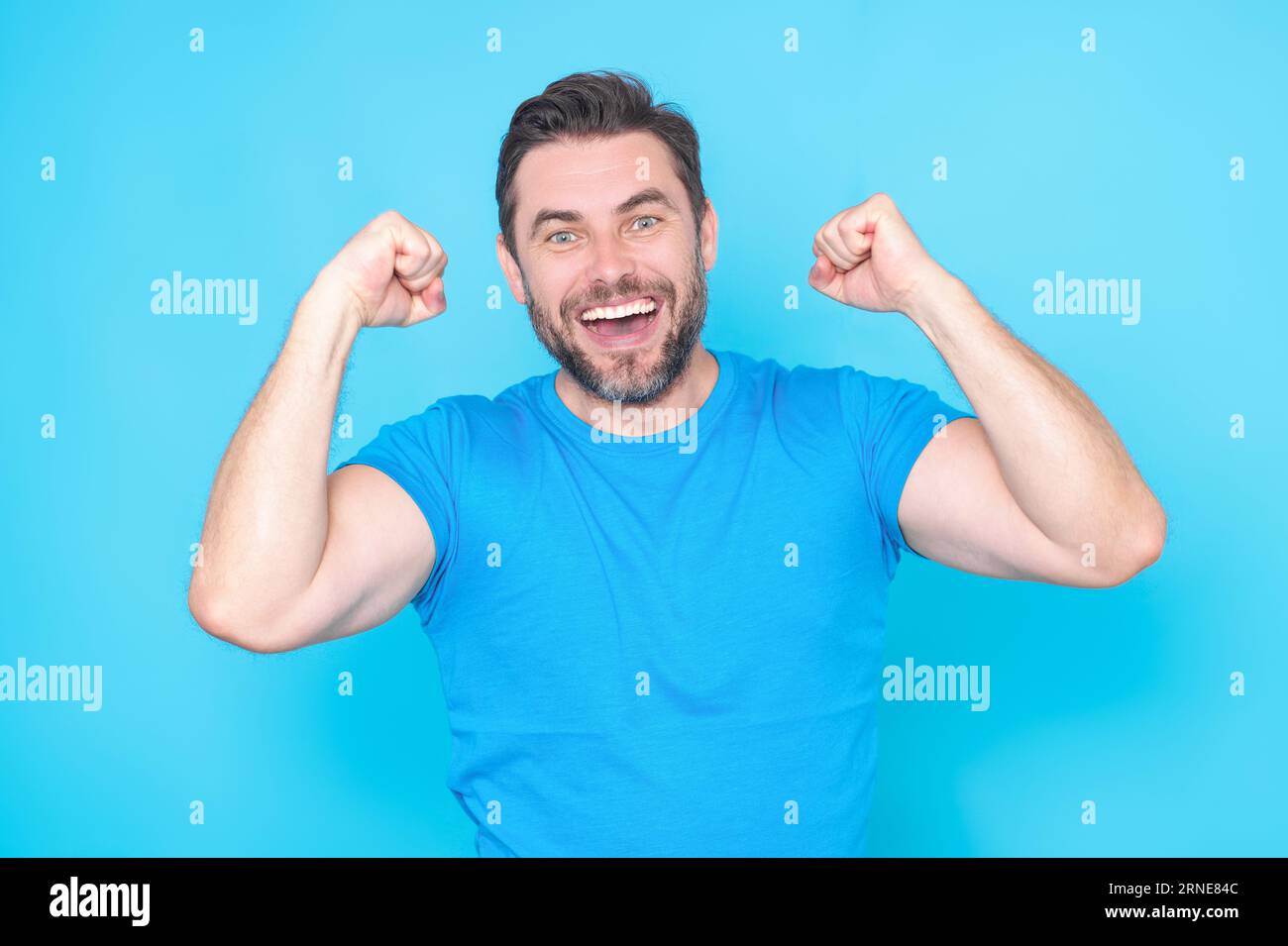 Portrait of excited man. Wow, it's unbelievable. Excited man opening ...