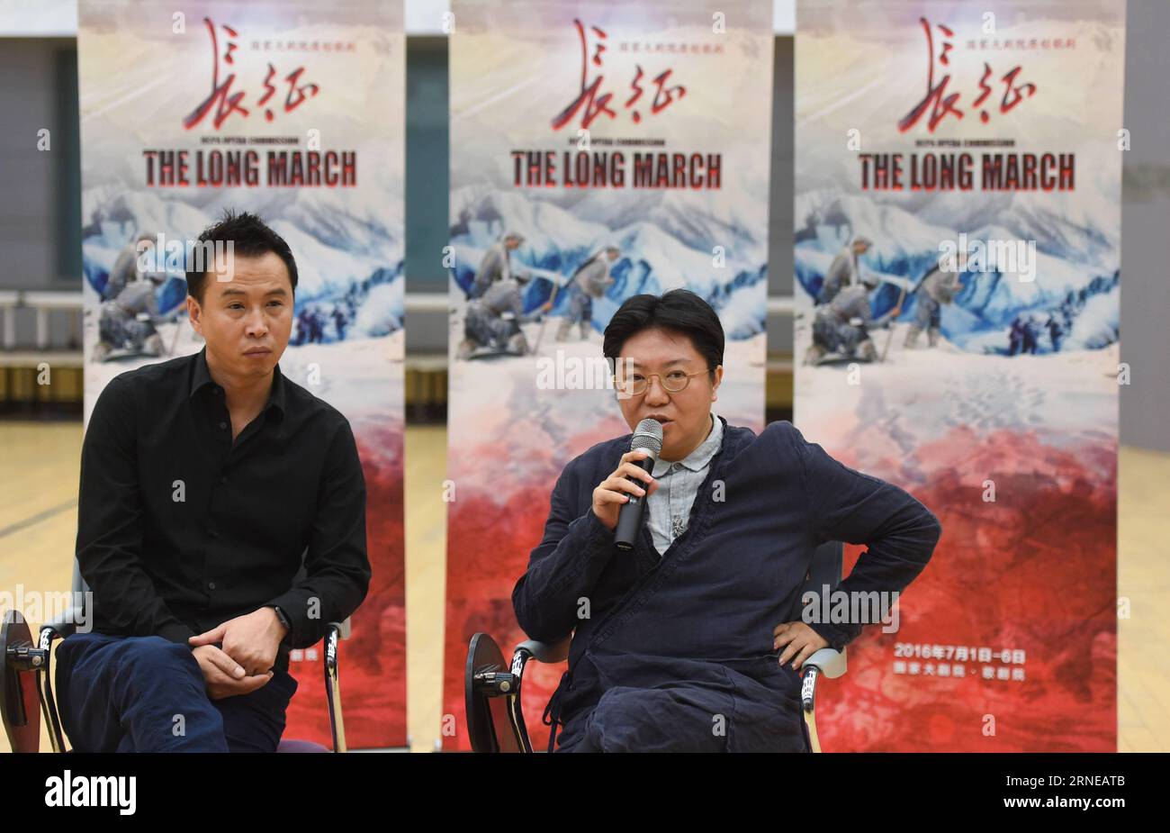 Directors Tian Qinxin (R) and Yang Xiaoyang introduces rehearsal of ...