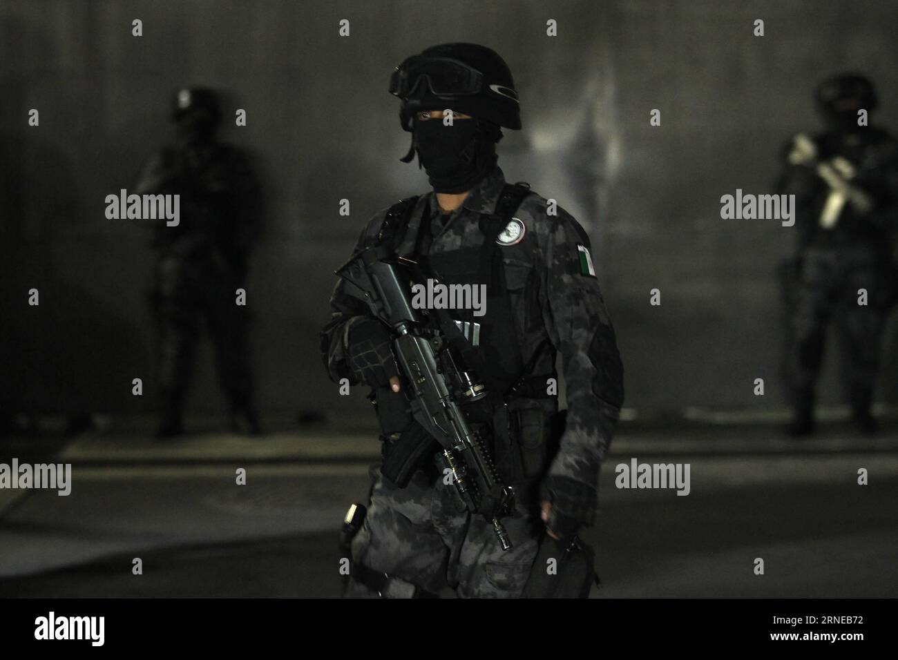 A security element stands guard during the arrival of Hector Palma ...
