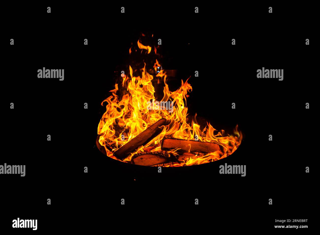 Hot fire flame burn wooden timber in camping fireplace isolated on ...
