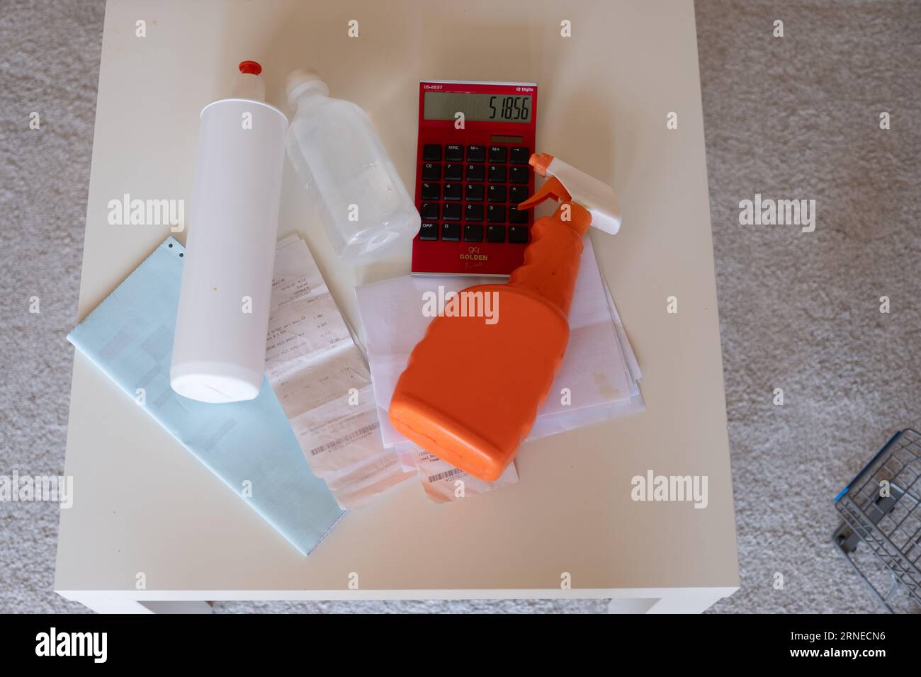 Living room table represents the living needs and costs with calculator ...