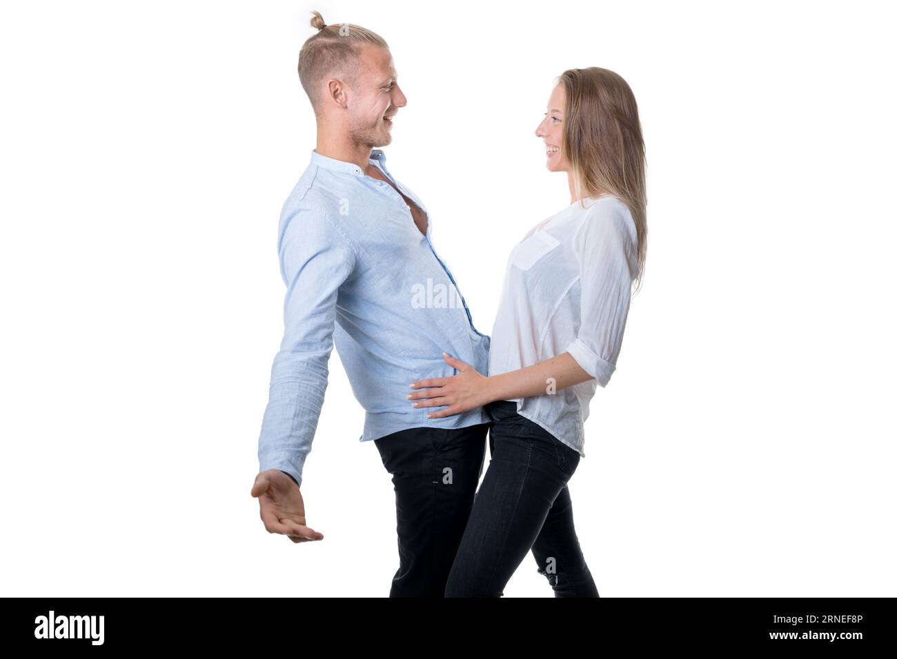 sweet young couple have fun and celebrate love while stand casual ...