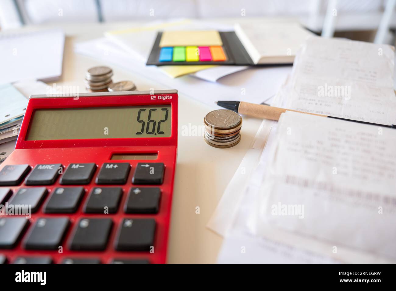Calculating with calculator hi-res stock photography and images - Alamy