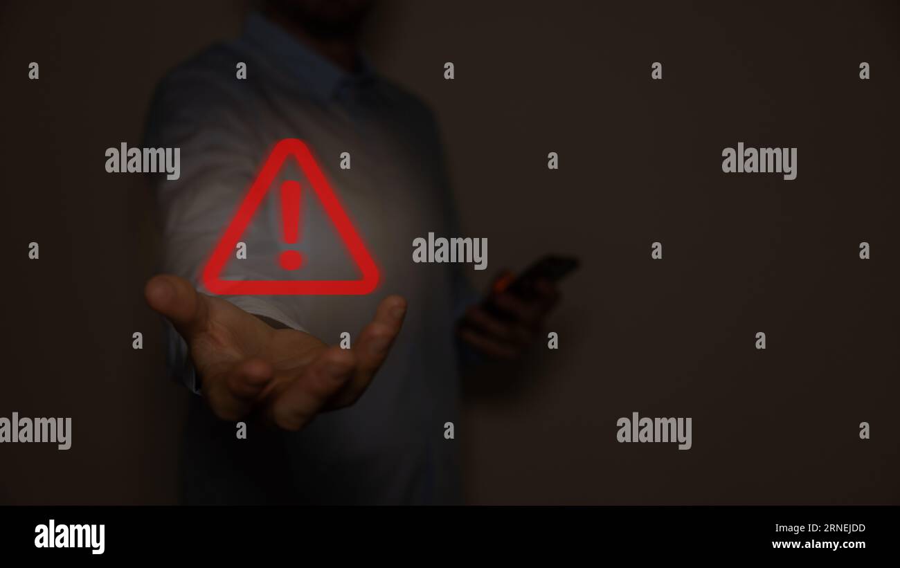 Hacking Concept. Attention warning attacker alert sign with exclamation mark on dark red ...