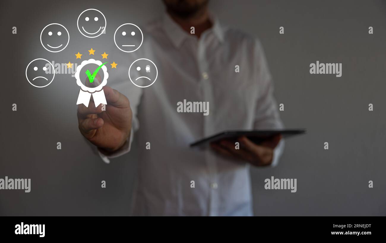 Businessman holding and showing the best quality assurance with golden ...