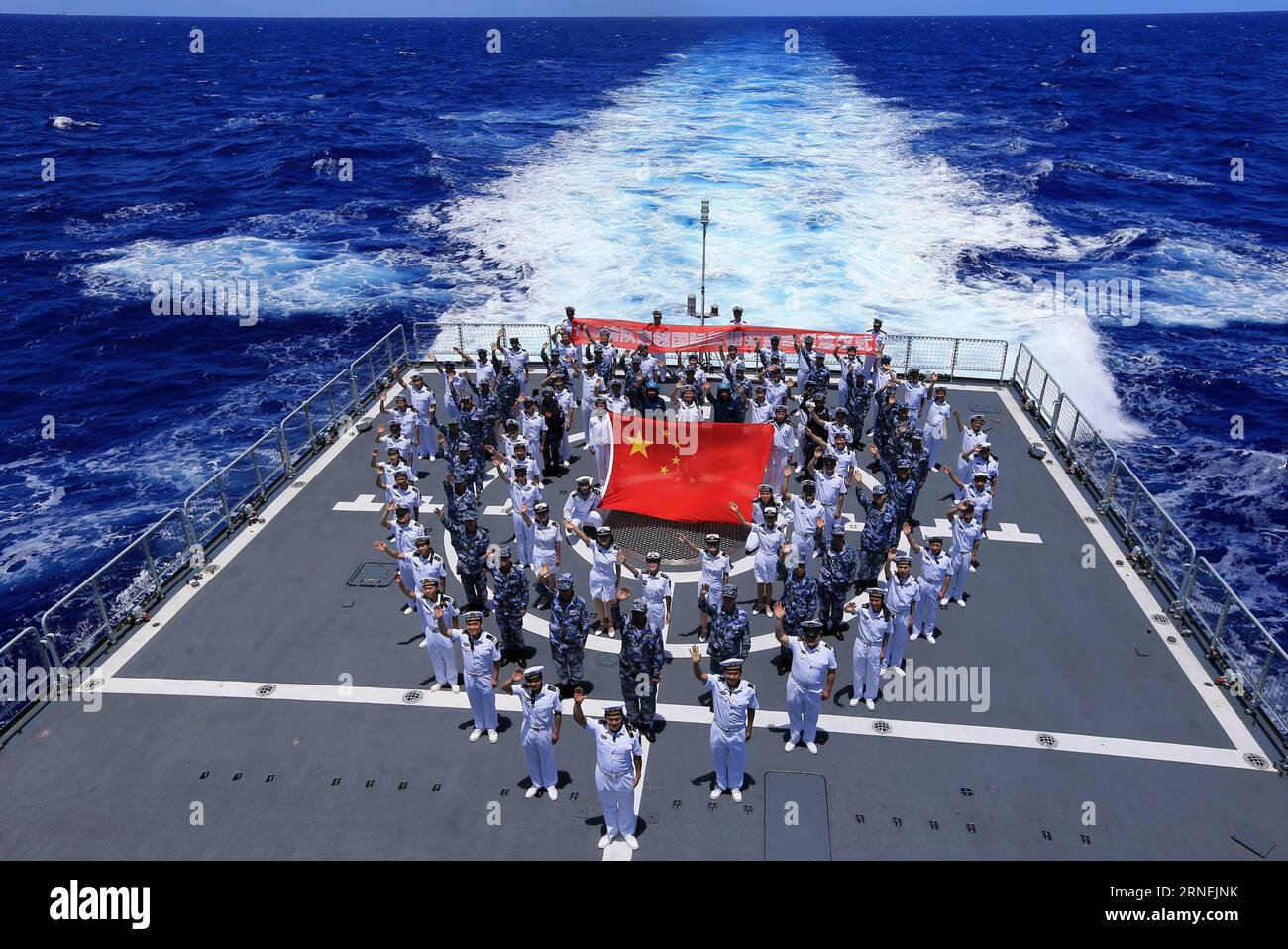 (160625) -- PACIFIC OCEAN, June 24, 2016 -- Chinese navy officers stand ...