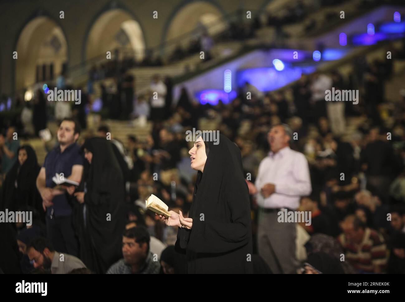 (160625) -- TEHRAN, June 25, 2016 -- Iranian Muslims pray during a ...