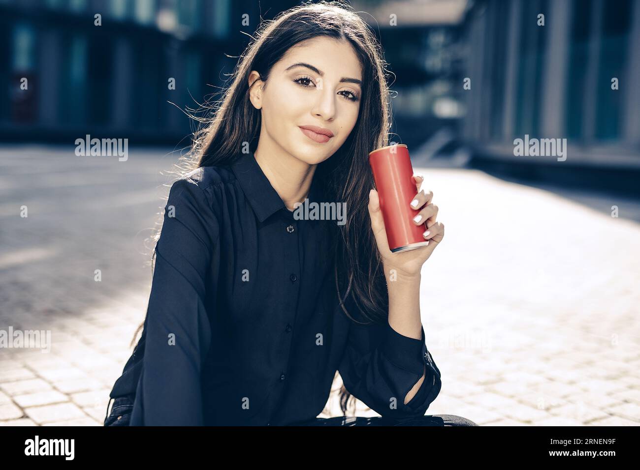 portrait of a teenage girl with brown hair sit on floor on middle of ...