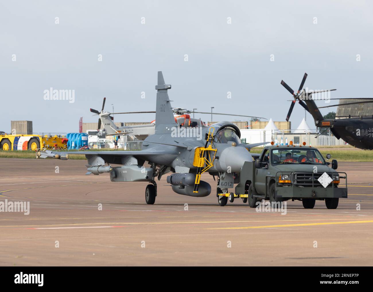 A Swedish SAAB JAS 39 Gripen jet fighter being towed at the 2023 Royal ...