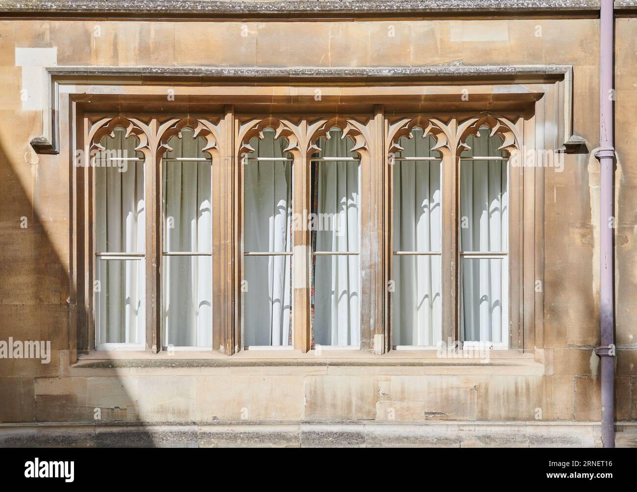 A pattern of windows at Oriel College, University of Oxford, England ...