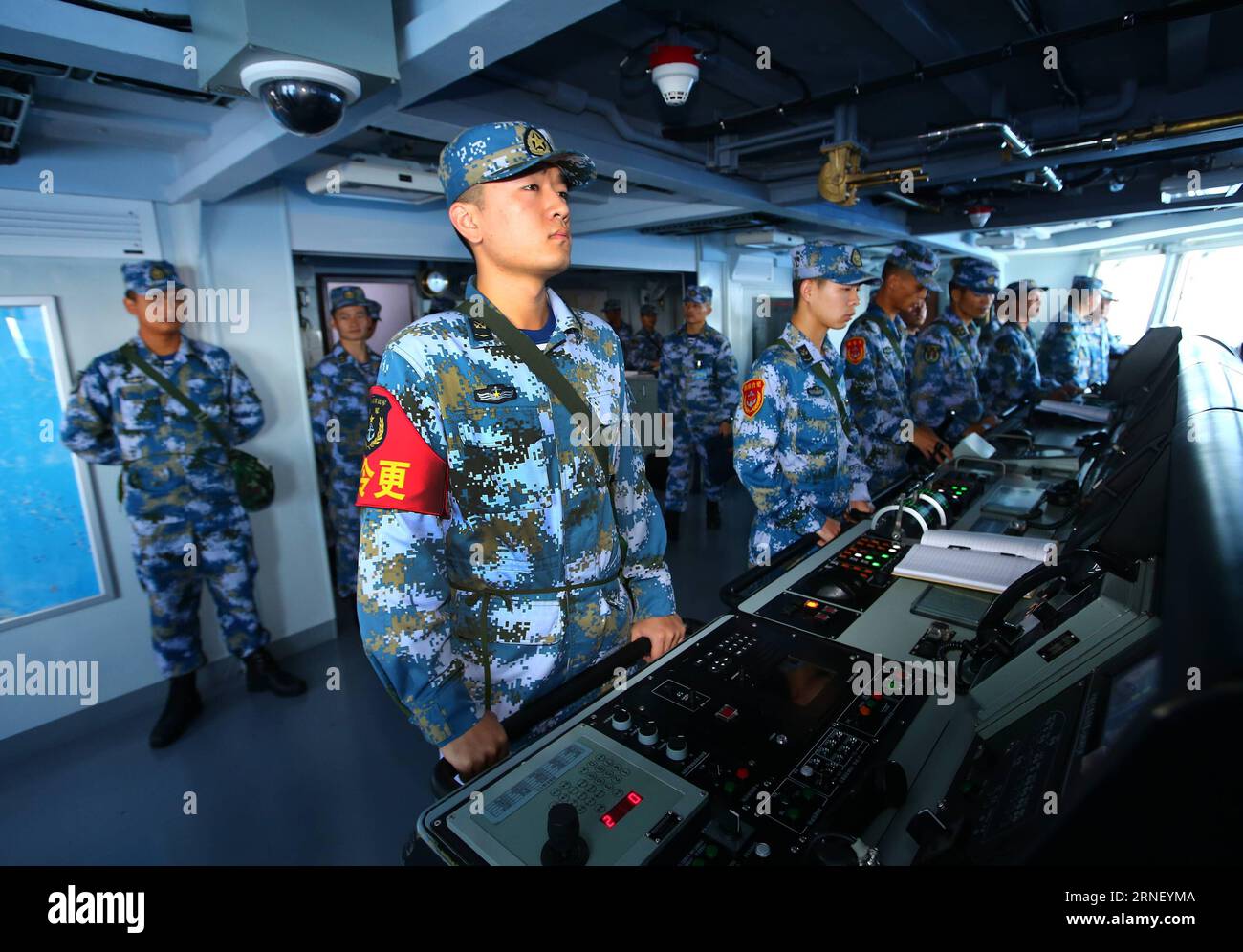 Chinese naval officers and soldiers work in the control room of missile ...