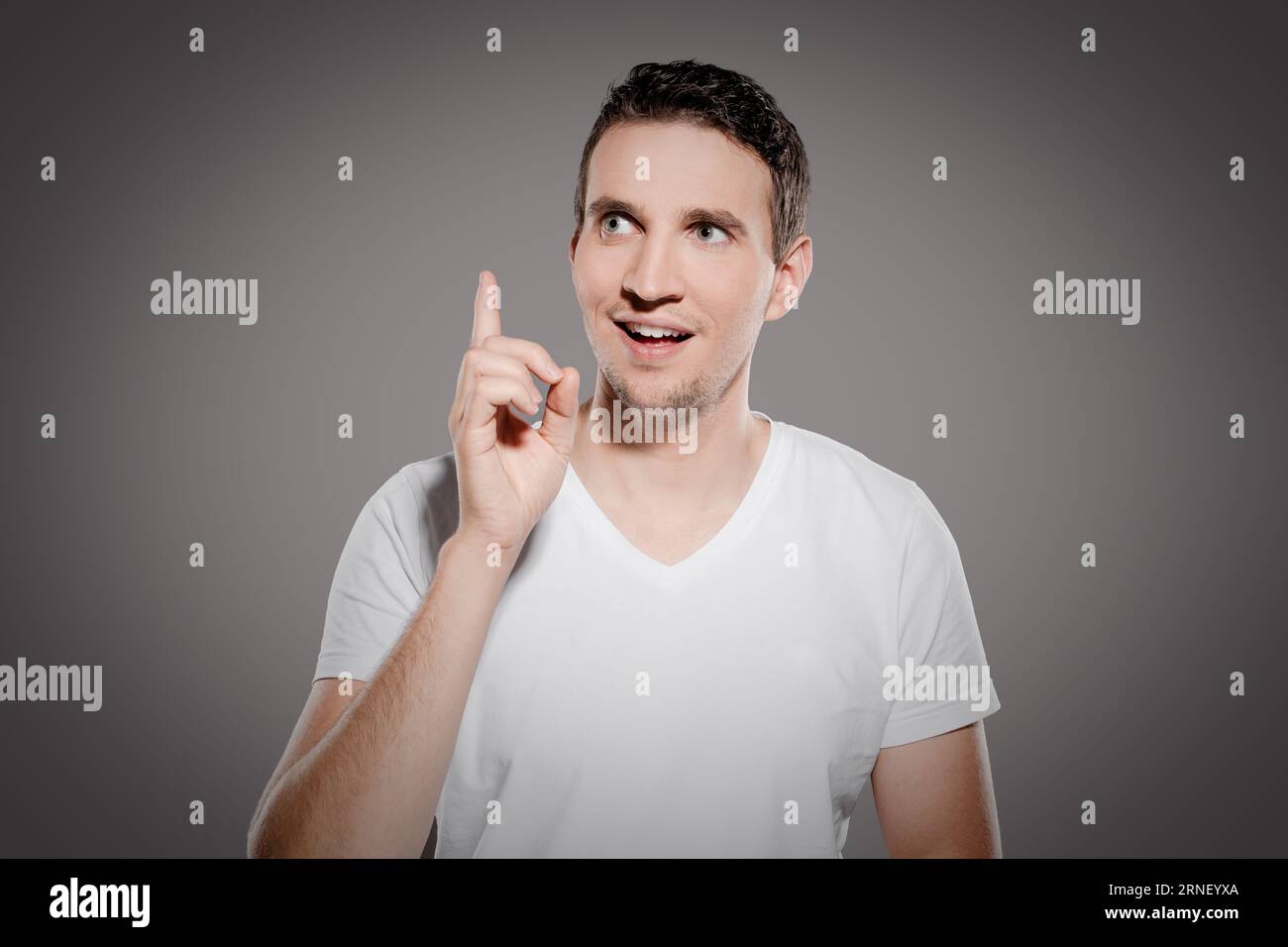 "have a notion" face expression of man while look at camera and show ...