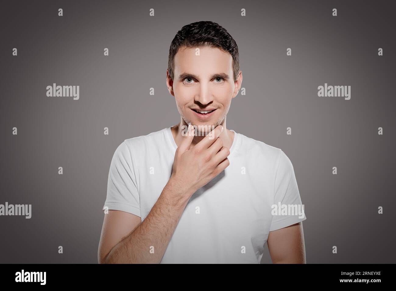 "have a new idea" face expression of man while look at camera and show ...