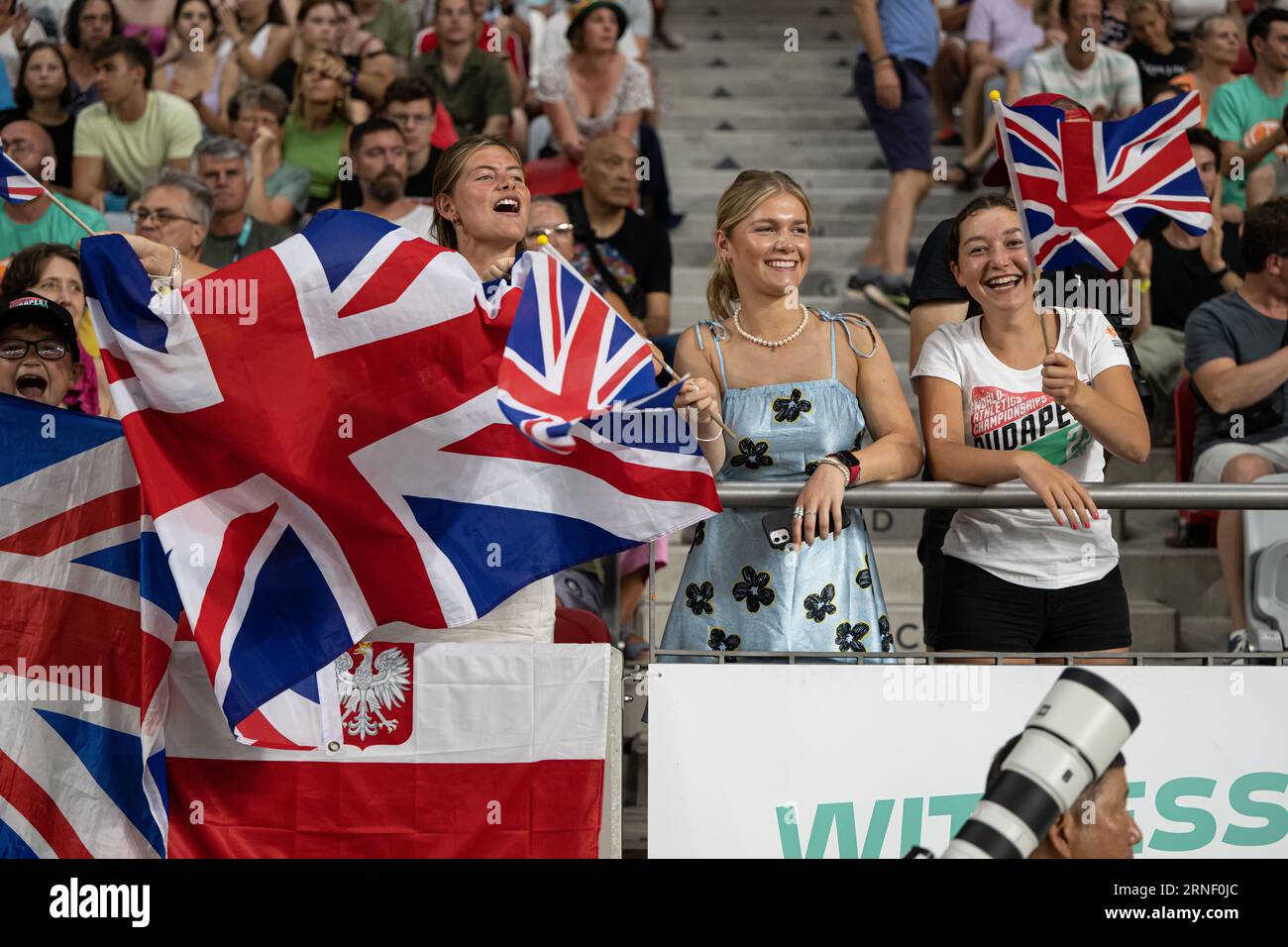 Great Britain fans cheering with their country's flags Stock Photo - Alamy