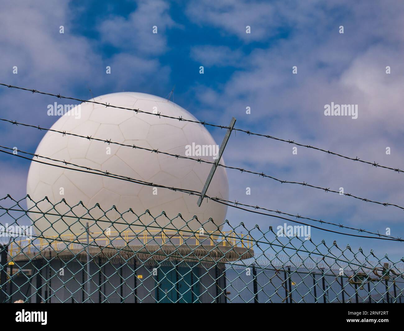 The white radar dome at Remote Radar Head (RRH) Benbecula in the Outer Hebrides, Scotland, UK ...