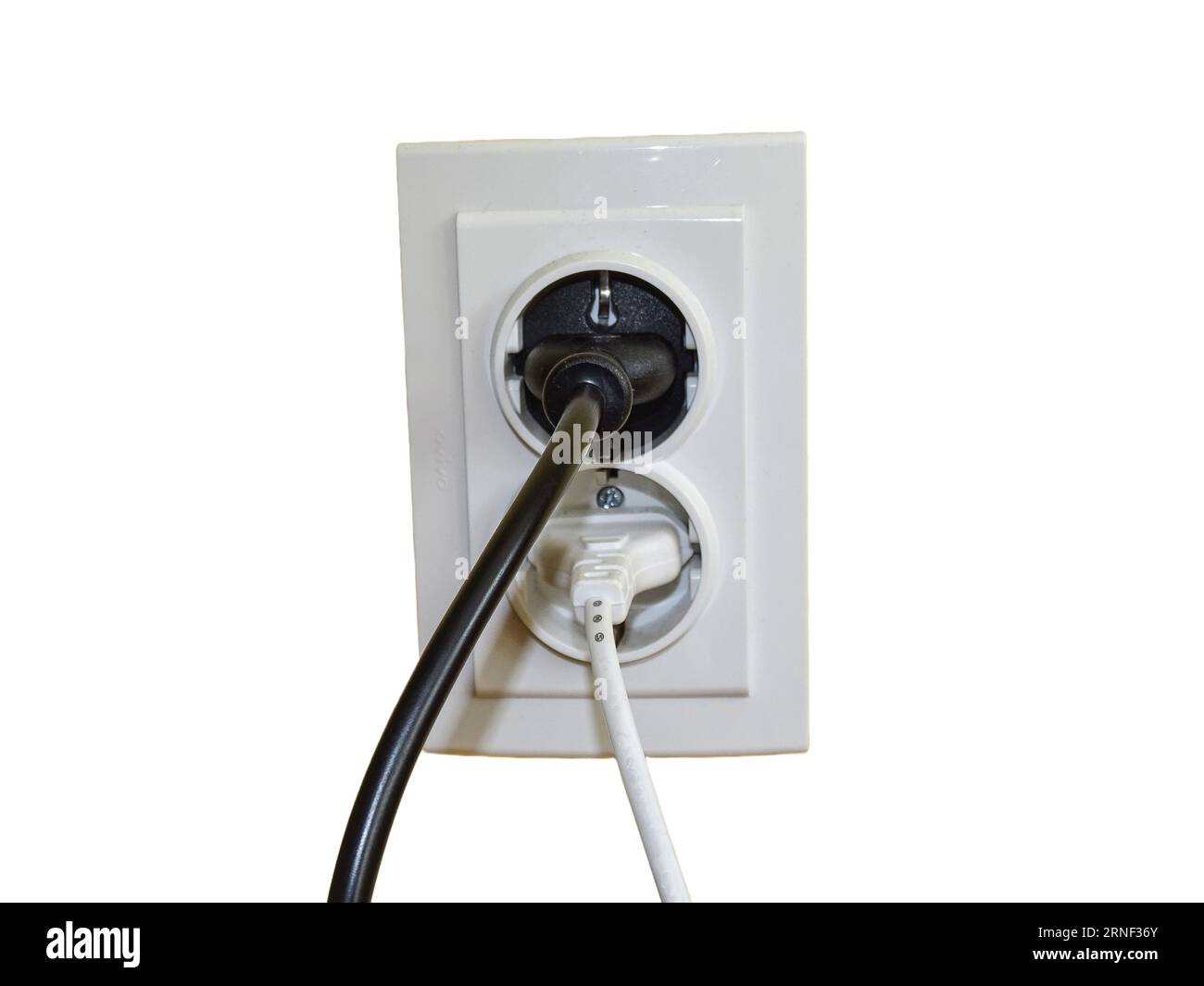 A black plug and a white plug in the socket Stock Photo - Alamy
