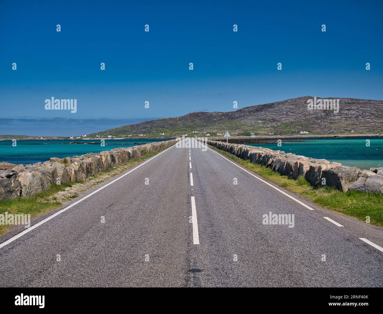 The causeway road link between the islands of Eriskay and South Uist in ...