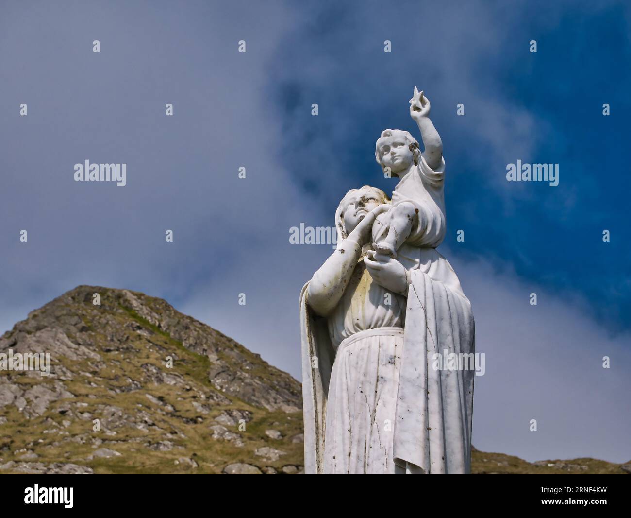 The white statue of Our Lady of the Sea near the top of the hill of ...