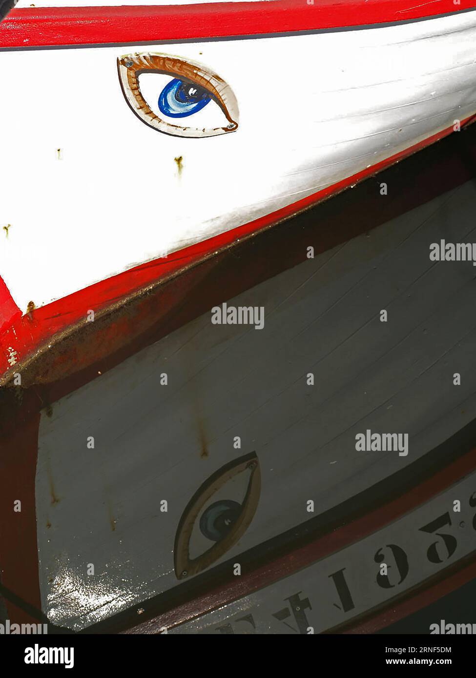 Local fishing boat decorated with a with a lucky eye Stock Photo - Alamy