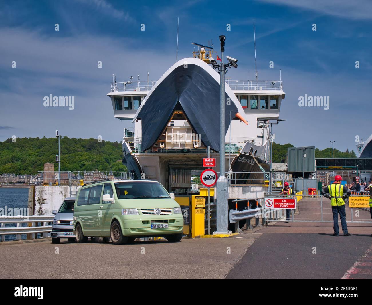 A green, Irish registered VW motor caravan disembarks the CalMac ...