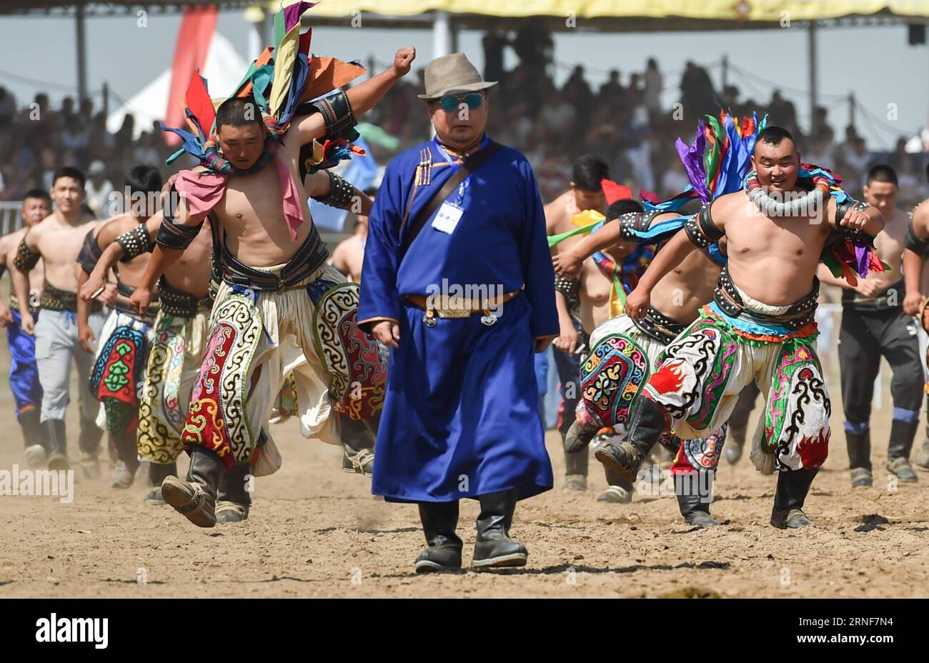 Mongolian wrestlers in hi-res stock photography and images - Alamy