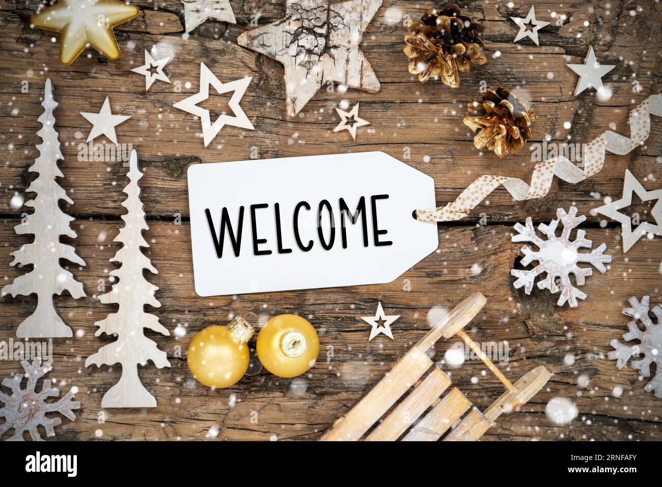 Rustic Christmas Decor With Snowfall And Label With Text Welcome Stock ...