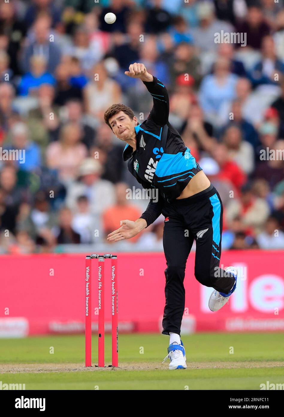 Mitchell Santner #74 of New Zealand in bowling action during the Second ...