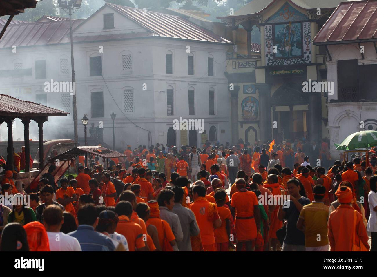 (160808) -- KATHMANDU, Aug. 8, 2016 -- Hindu devotees gather to offer ...