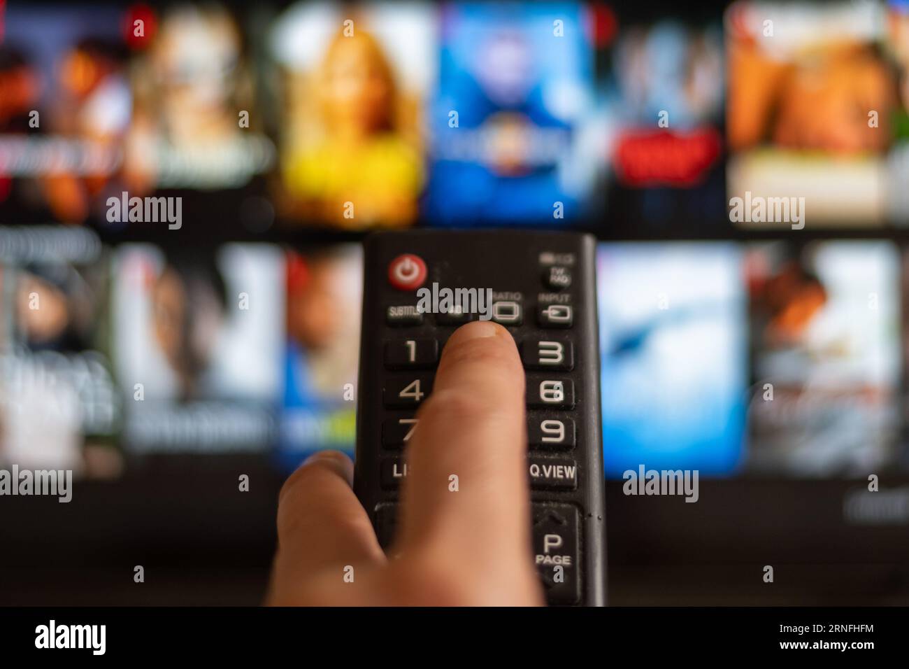 Unrecognizable Person Relaxing At Home Watching TV. View Streaming ...