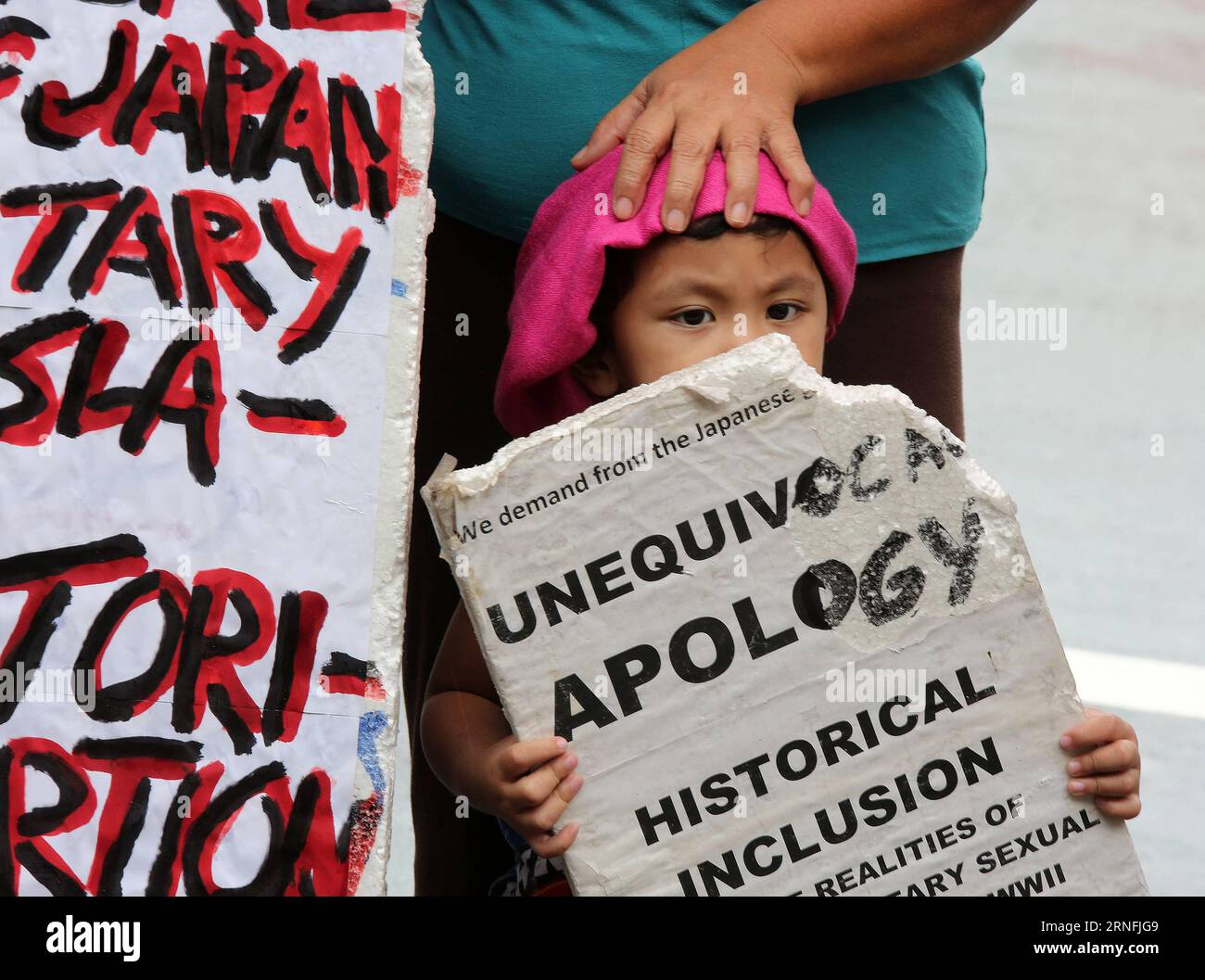 (160812) -- PASAY CITY, Aug. 12, 2016 -- A child holds a placard during ...