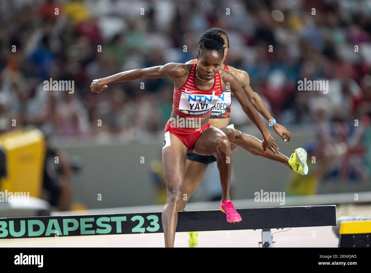 Winfred Yavi participating in the 3000 m Steeplechase at the World ...