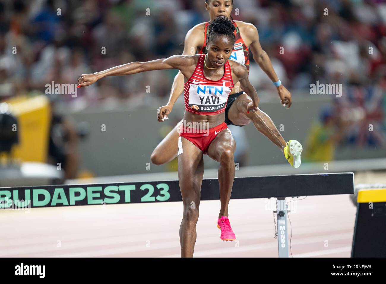 Winfred Yavi participating in the 3000 m Steeplechase at the World ...