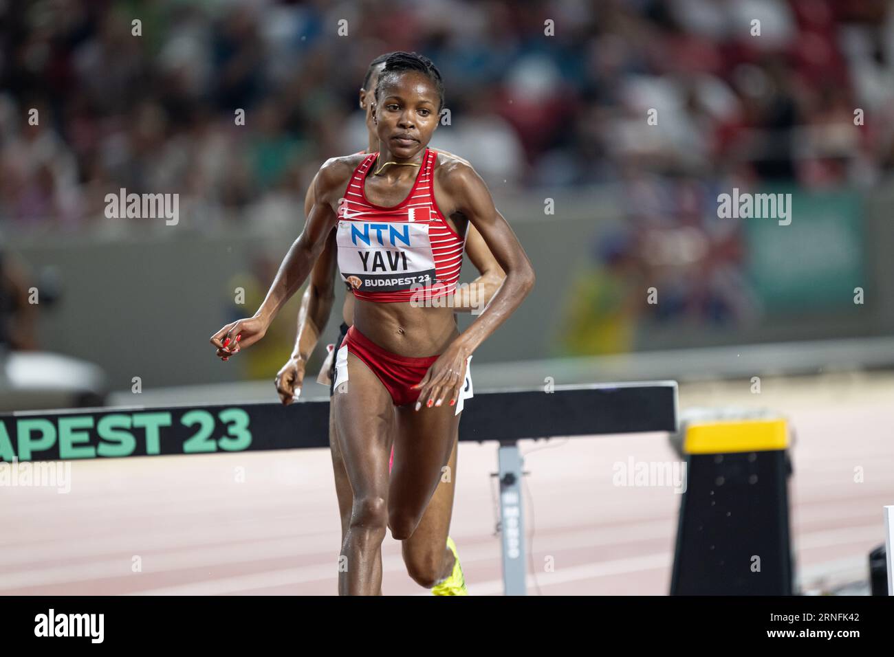 Winfred Yavi participating in the 3000 m Steeplechase at the World ...
