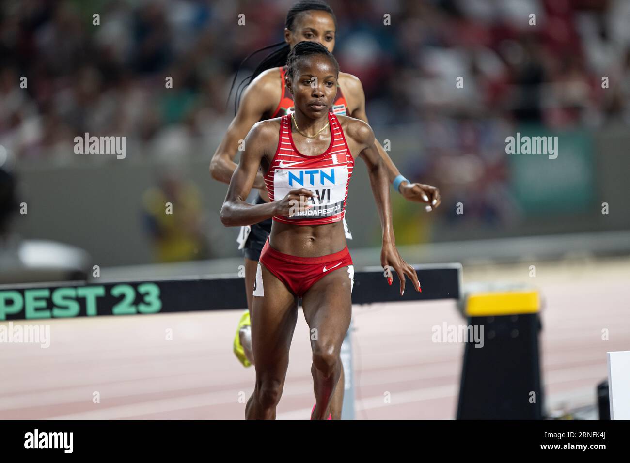 Winfred Yavi participating in the 3000 m Steeplechase at the World ...
