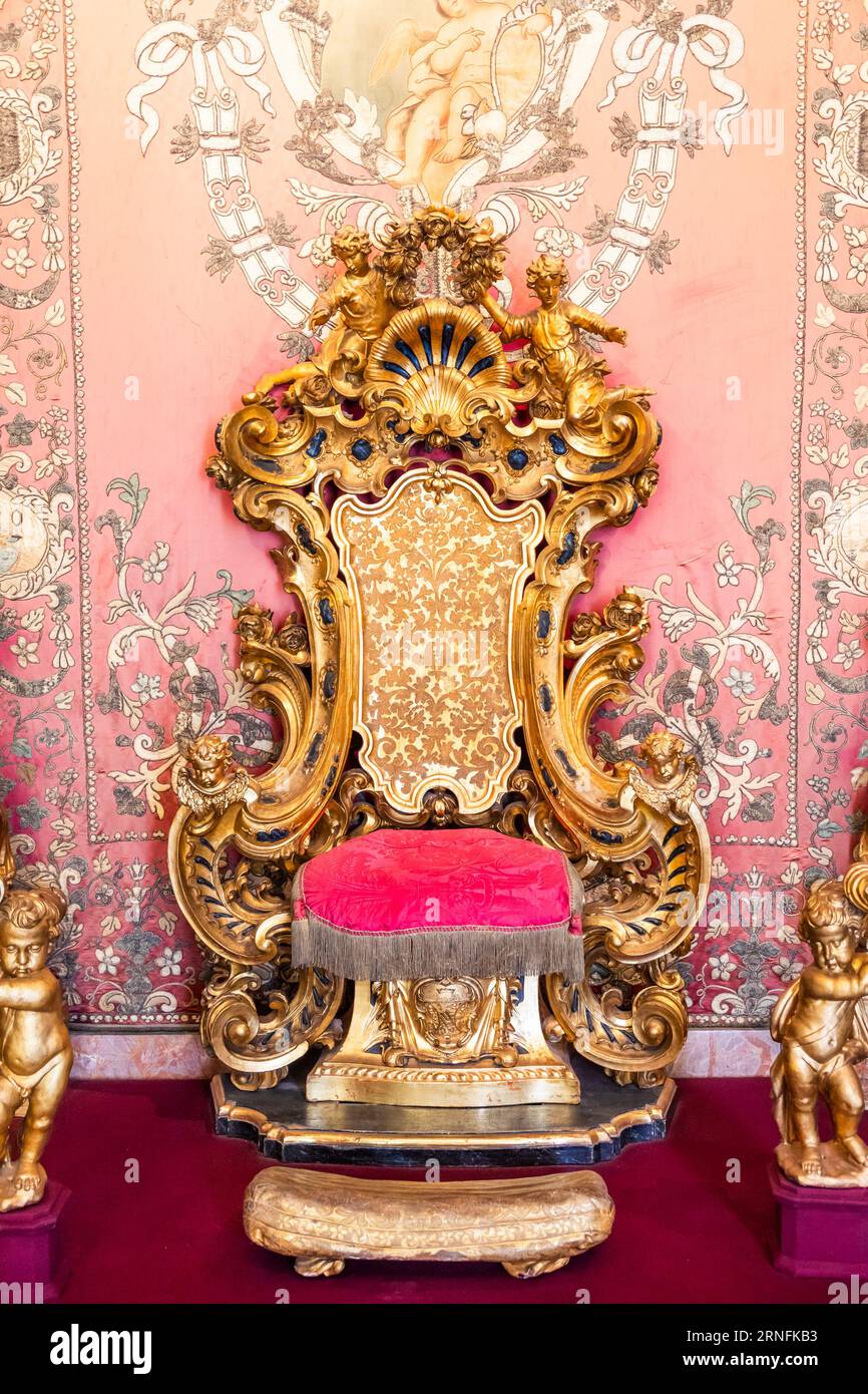 Isola Bella, Italy - 1 August 2023: antique throne in gold and red ...