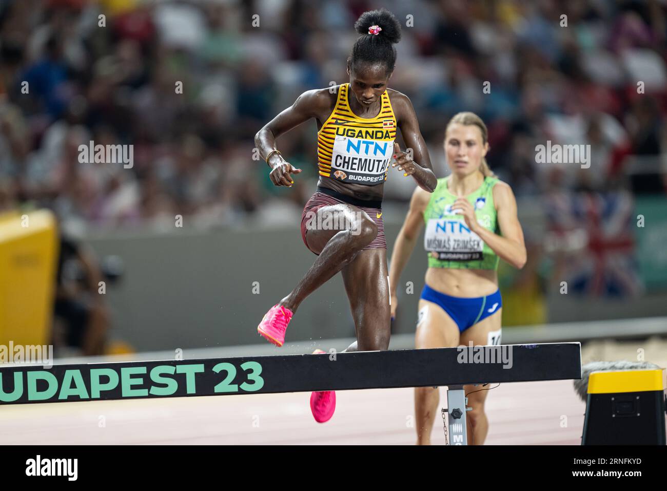 Peruth Chemutai participating in the 3000 m Steeplechase at the World ...