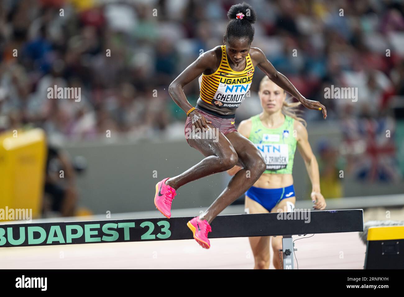 Peruth Chemutai participating in the 3000 m Steeplechase at the World ...