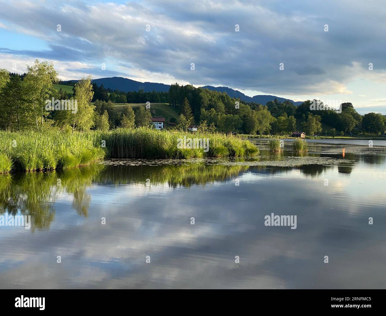 Scenic sky above the lake of Bad Bayersoien in the Bavarian Alps ...