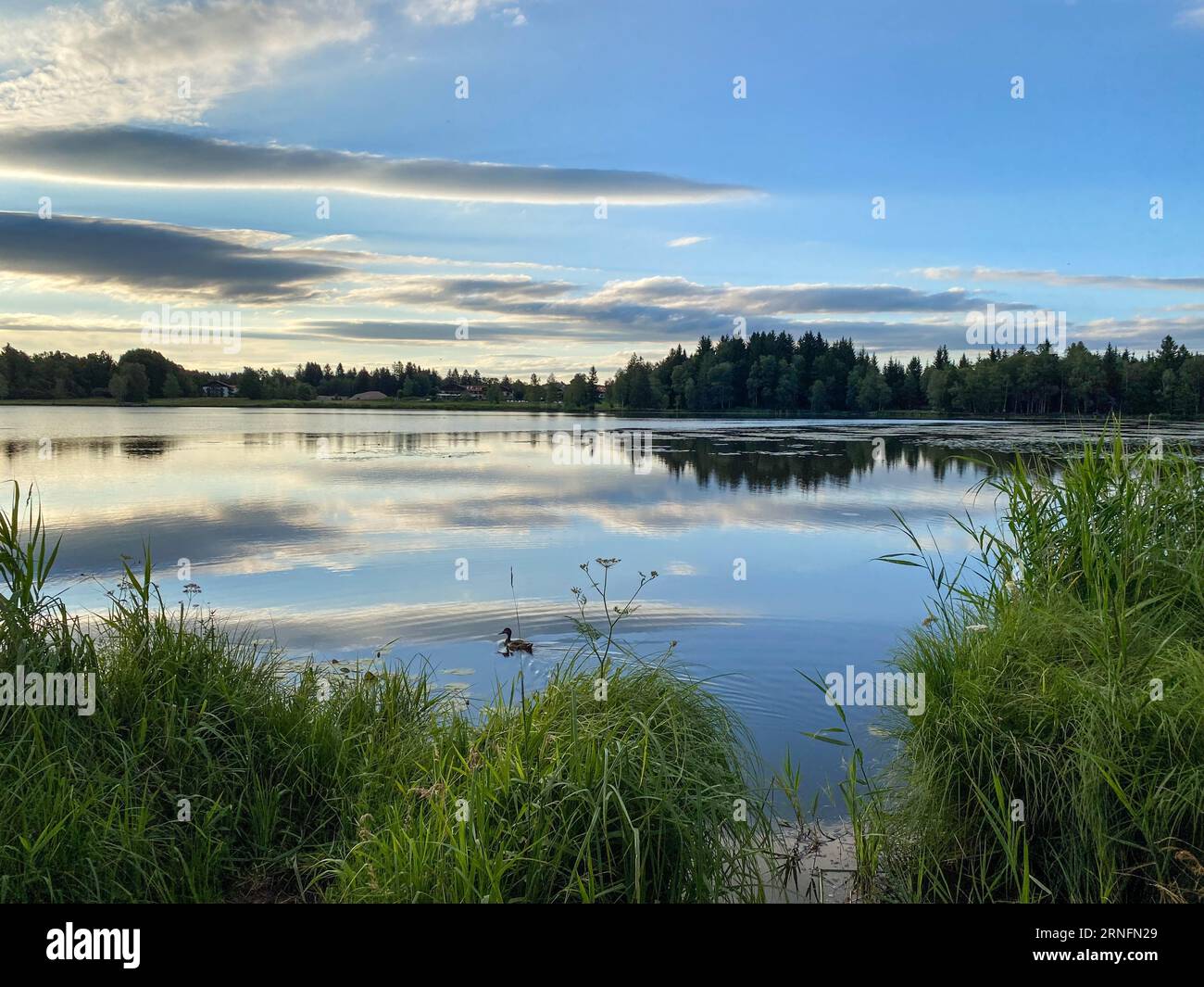 Scenic sky above the lake of Bad Bayersoien in the Bavarian Alps ...