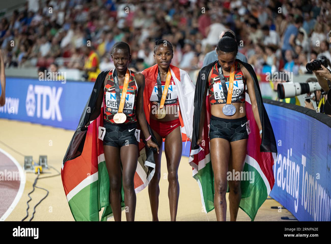 Winfred Mutile YAVI celebrating her victory with her country's flag in ...