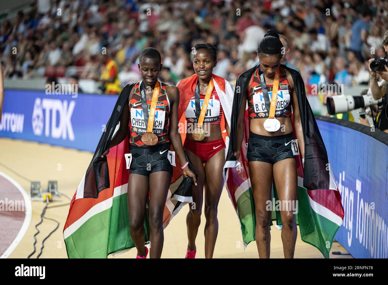 Winfred Mutile YAVI celebrating her victory with her country's flag in ...