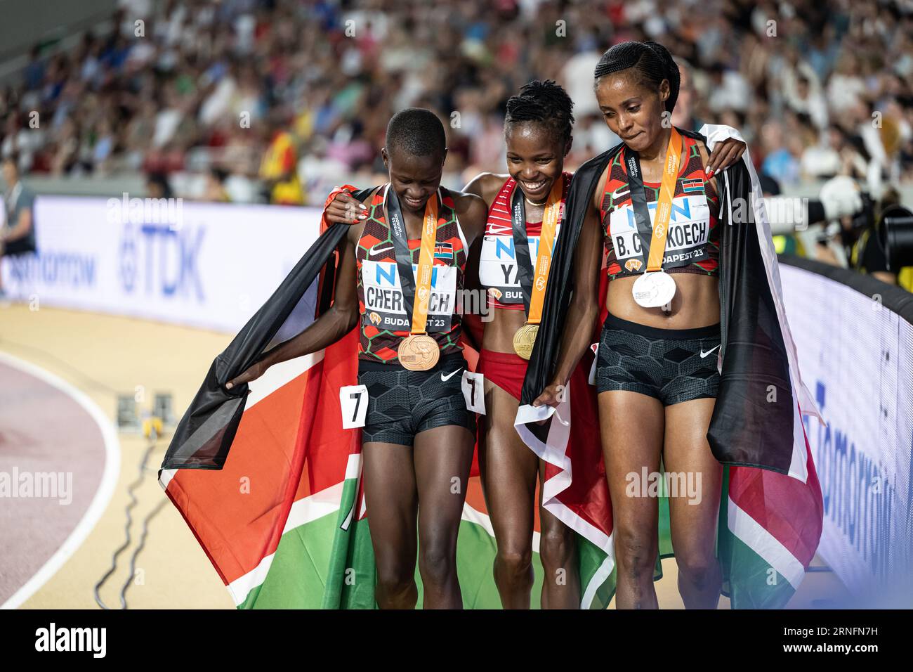 Winfred Mutile YAVI celebrating her victory with her country's flag in ...