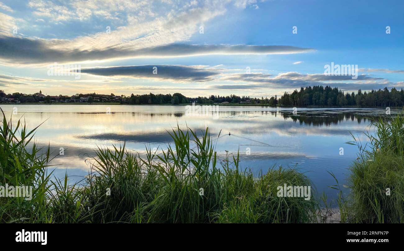 Scenic sky above the lake of Bad Bayersoien in the Bavarian Alps ...