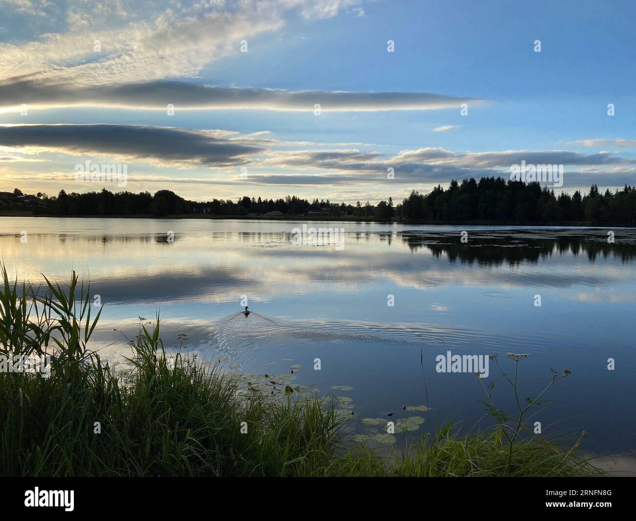 Scenic sky above the lake of Bad Bayersoien in the Bavarian Alps ...