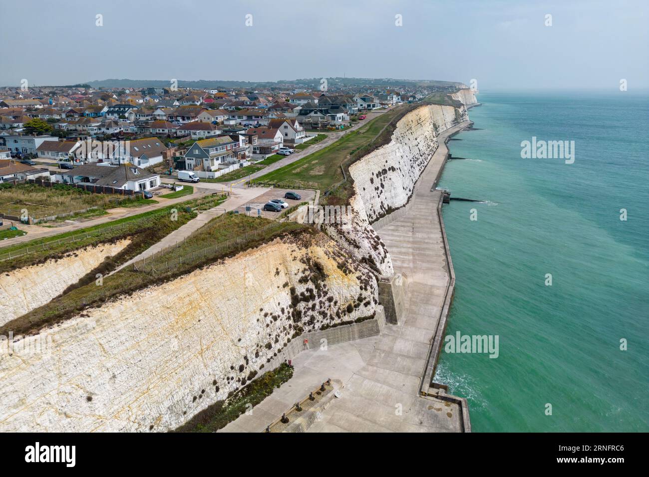 Aerial view of the chalk cliffs & undercliff seaside promenade at ...