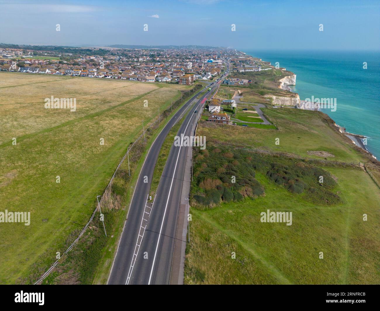 Aerial view of the South Coast Road (A259) travelling east over the ...