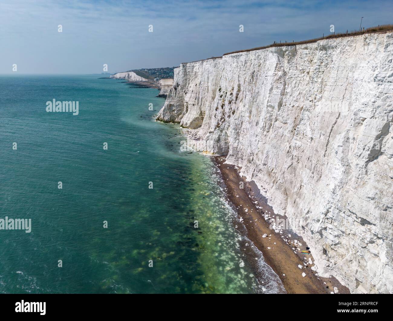Aerial view of the chalk Telscombe Cliffs at Peacehaven, East Sussex ...