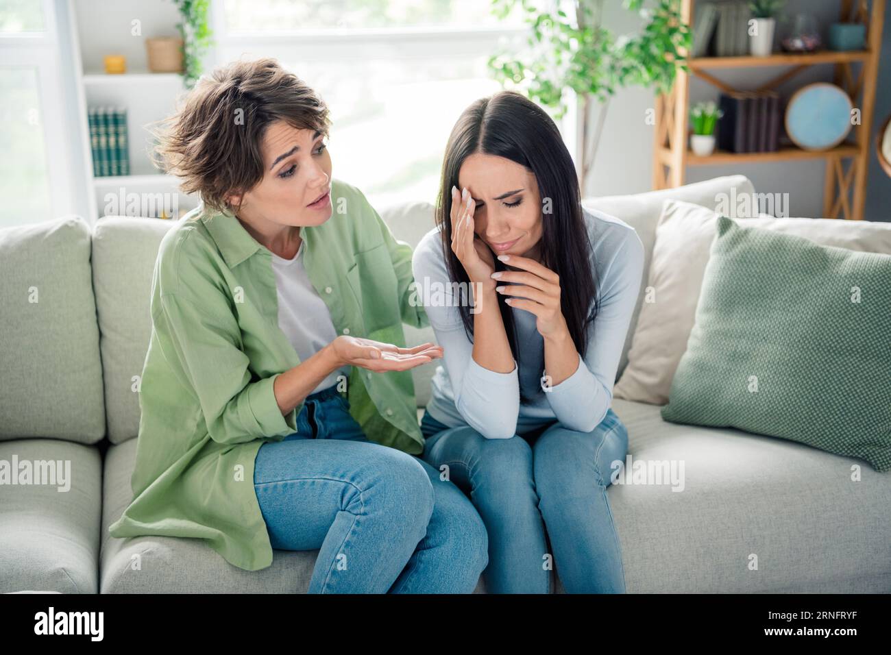 Photo of supportive girl sit couch communicate calming comforting ...