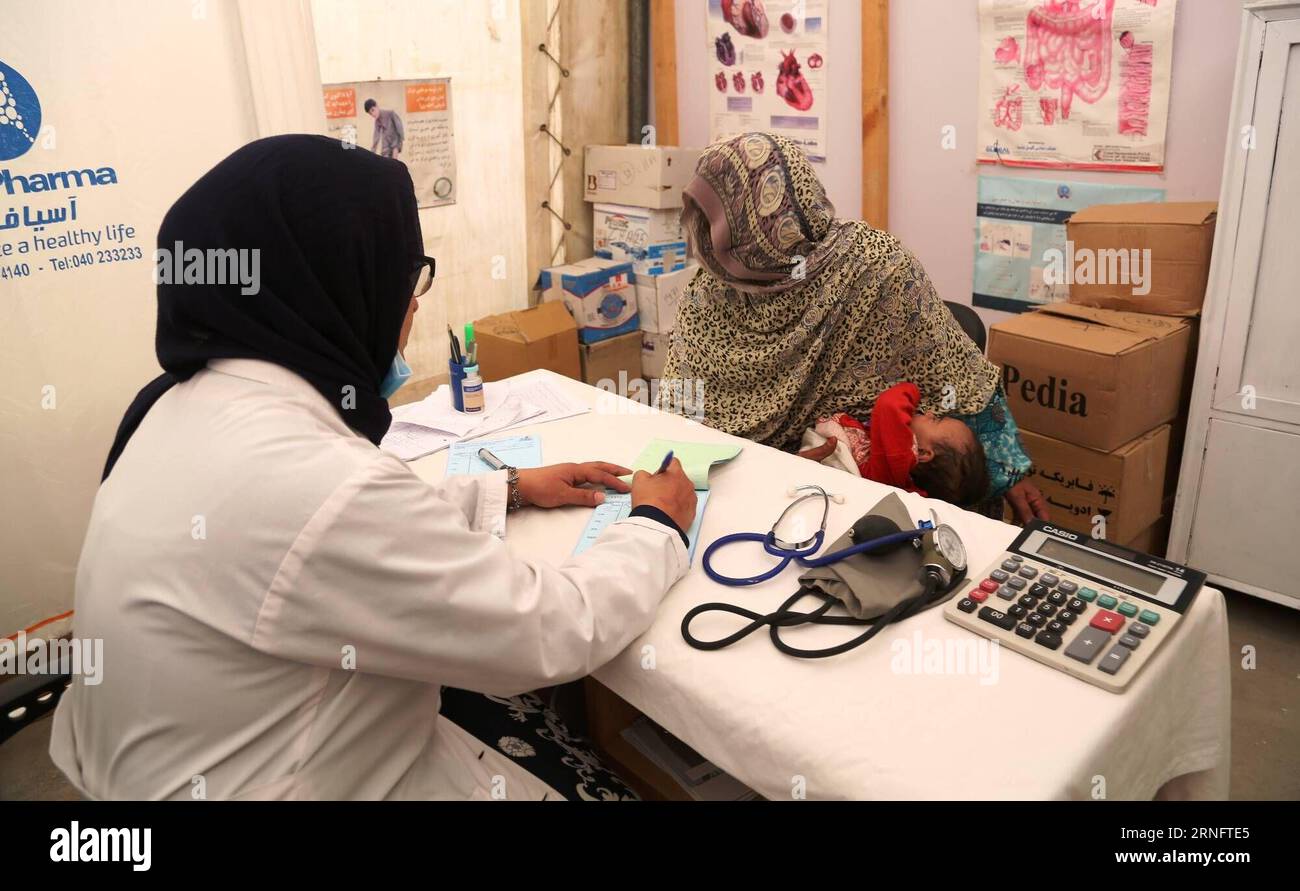 Unhcr camp doctor hi-res stock photography and images - Alamy