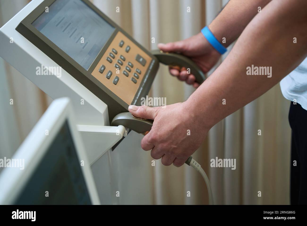 Adult person being examined on BCA machine in medical center Stock ...
